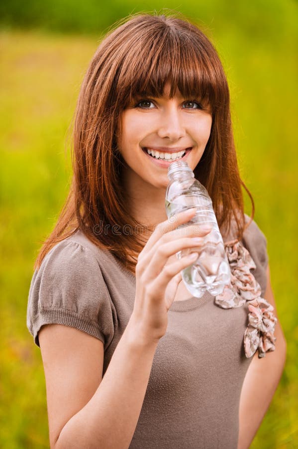 Young Smiling Woman Drinking Water Stock Image - Image of attractive ...