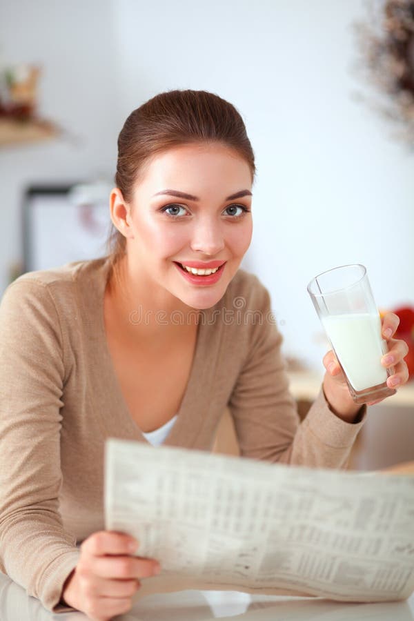 Young Smilling Woman Standing in Her Kitchen Stock Image - Image of ...