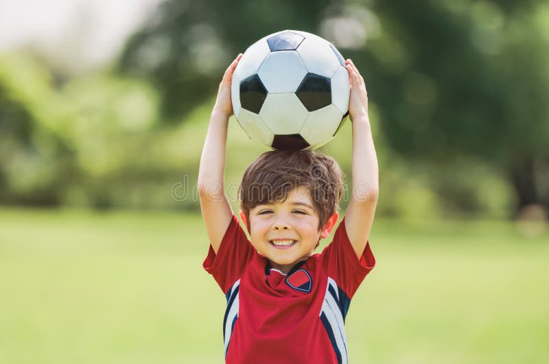 Young Soccer Player Having Fun on a Field with Ball Stock Image - Image ...