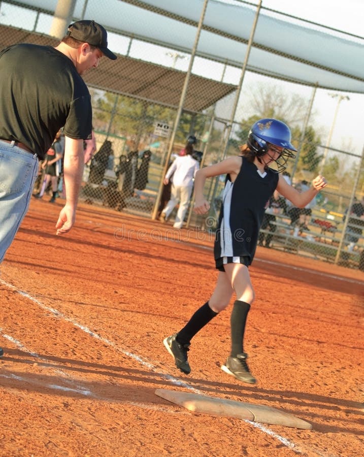 Young Softball Player Running To Base Stock Image - Image of kids ...
