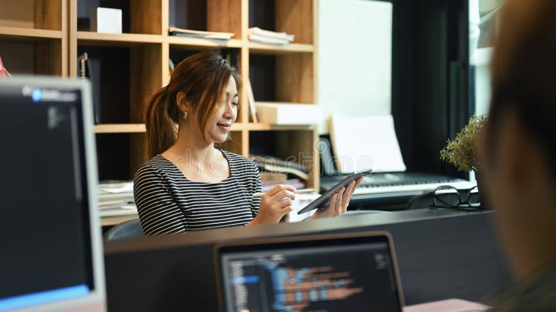 Young Software Developers Team Brainstorming and Working Together for ...