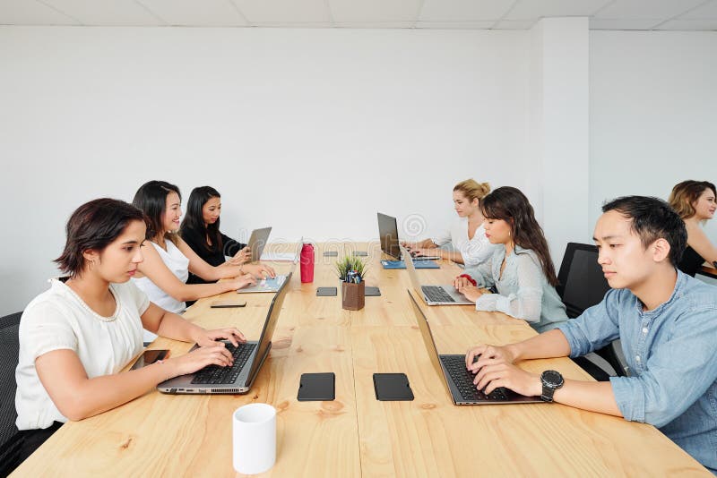 Software Developers Working on Laptops Stock Image - Image of studying ...
