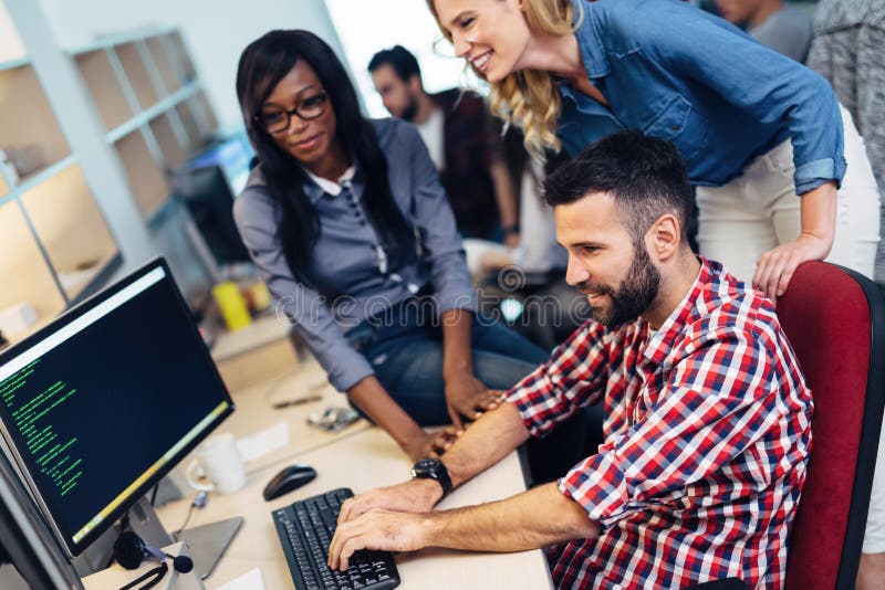 Software Engineers Working on Project and Programming in Company Stock Photo - Image of ...