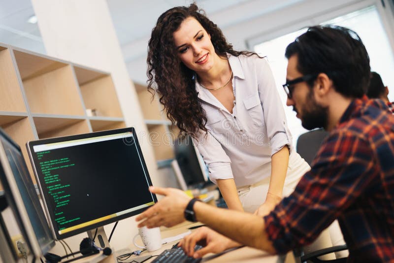 Software Engineers Working on Project and Programming in Company Stock ...