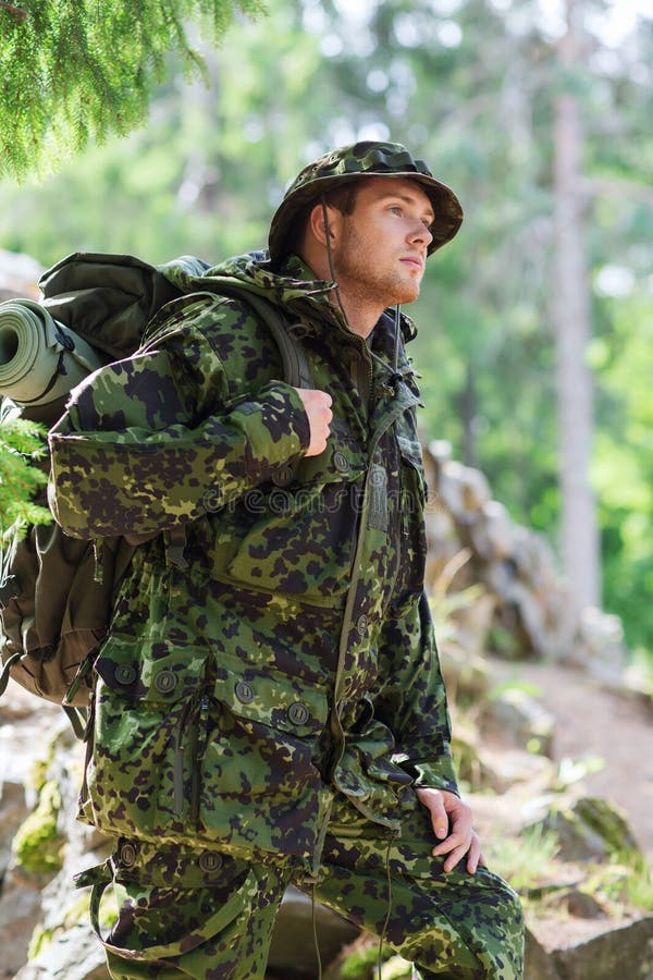 Young Soldier with Backpack in Forest Stock Image - Image of ...