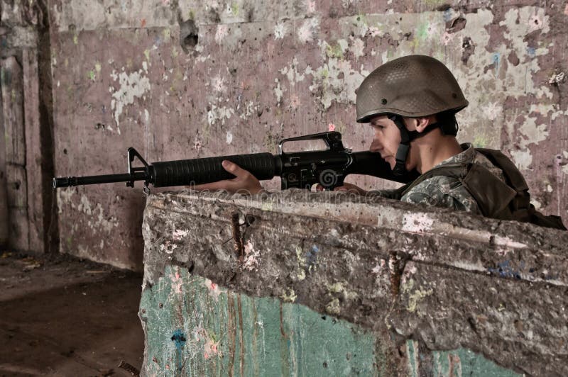 Young Soldier Behind Obstacle Stock Photo - Image of action, assault ...