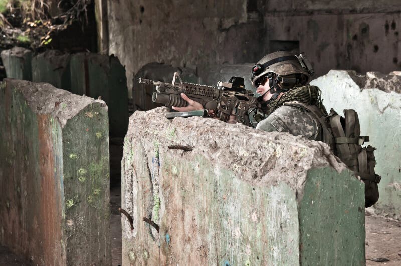 Young Soldier Behind Obstacle Stock Image - Image of power, sand: 17857625