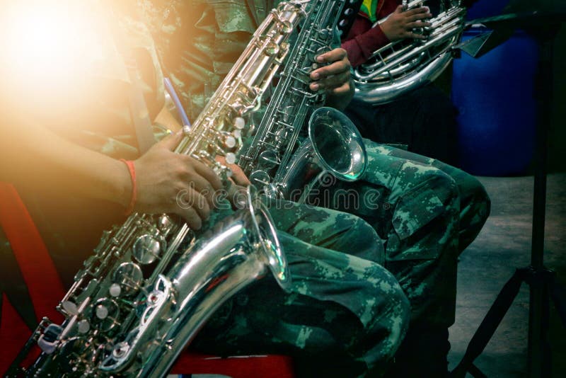 A Young Soldier with a Saxophone Playing the Musical Concept Stock ...