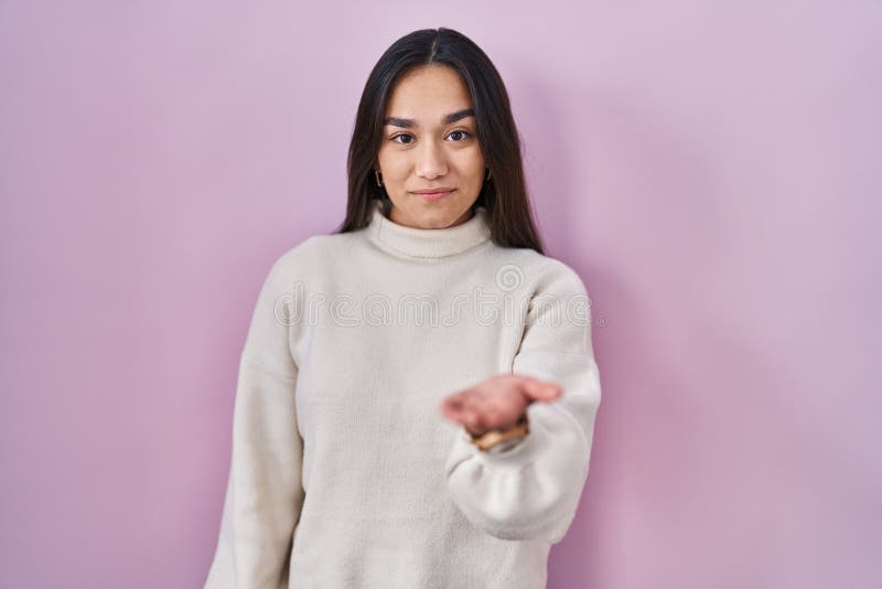 Young South Asian Woman Standing Over Pink Background Smiling Cheerful ... Young South Asian Woman Standing Over Pink Background Smiling Cheerful ...