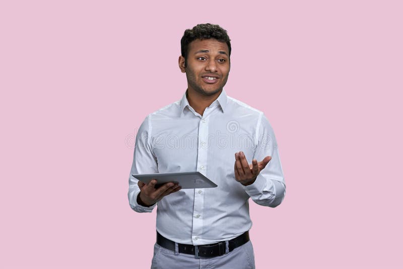 Young Southeast Asian Man Giving a Speech Using Tablet Pc. Stock Photo ...
