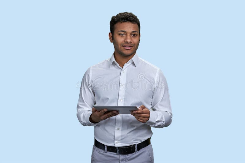 Young Southeast Indian Man Using Tablet Pc Computer. Stock Photo ...