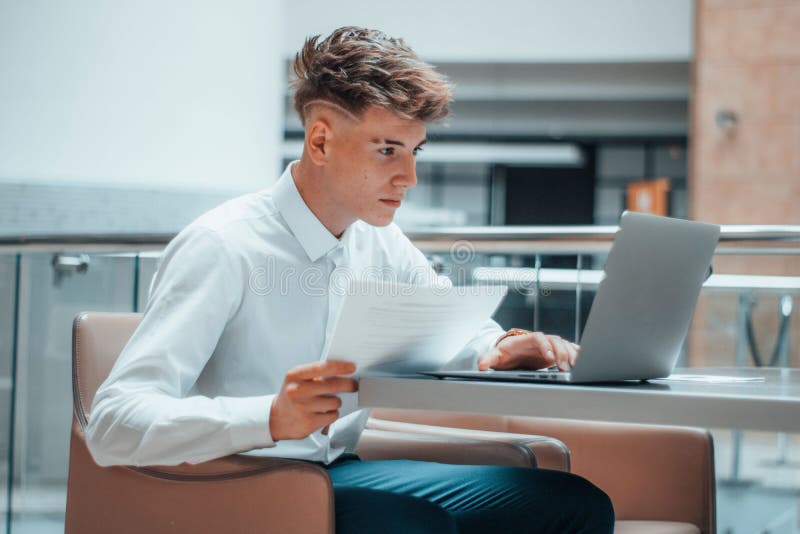 Spanish Man is Working with Documents in Laptop Stock Image - Image of ...