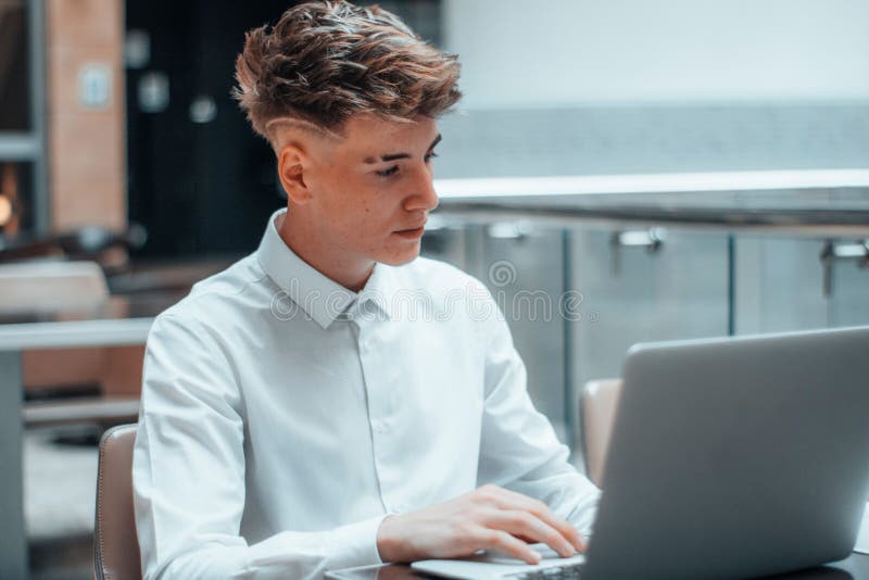 Young Spanish Man Working on a Computer Stock Image - Image of laptop ...