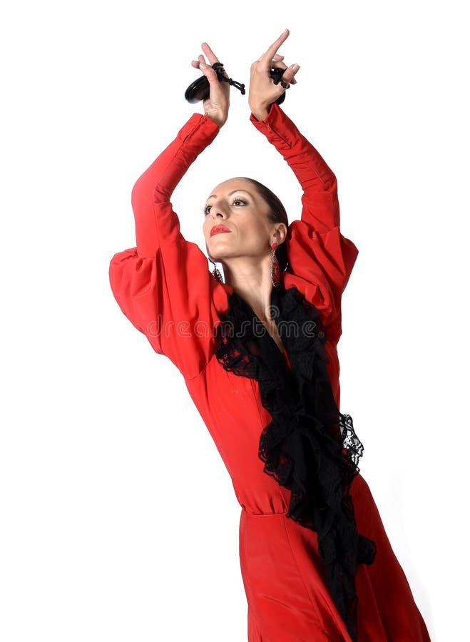 Young Spanish Woman Dancing Flamenco With Castanets In Her Hands Stock