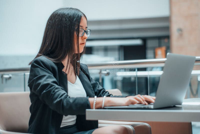 Young Spanish Woman Working on a Laptop Stock Image - Image of laptop ...