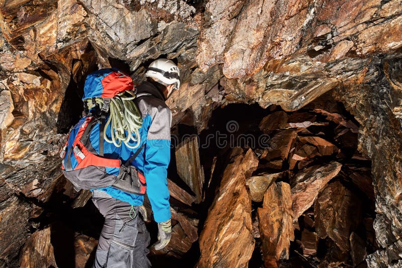 Cave Exploration with Helmet and Headlight Stock Image - Image of ...