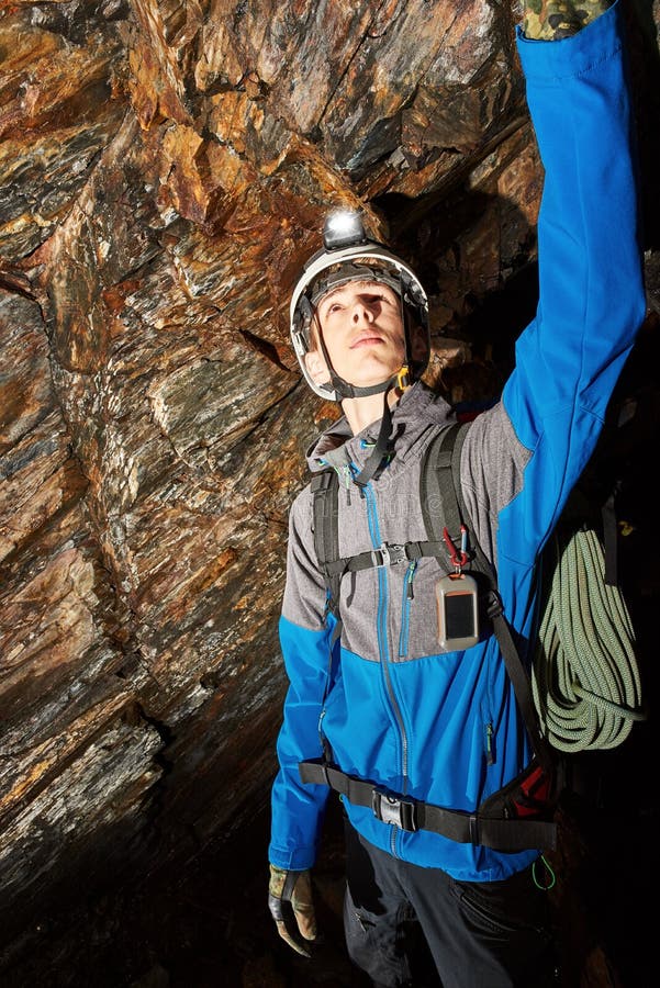 Cave Exploration with Helmet and Headlight Stock Photo - Image of ...
