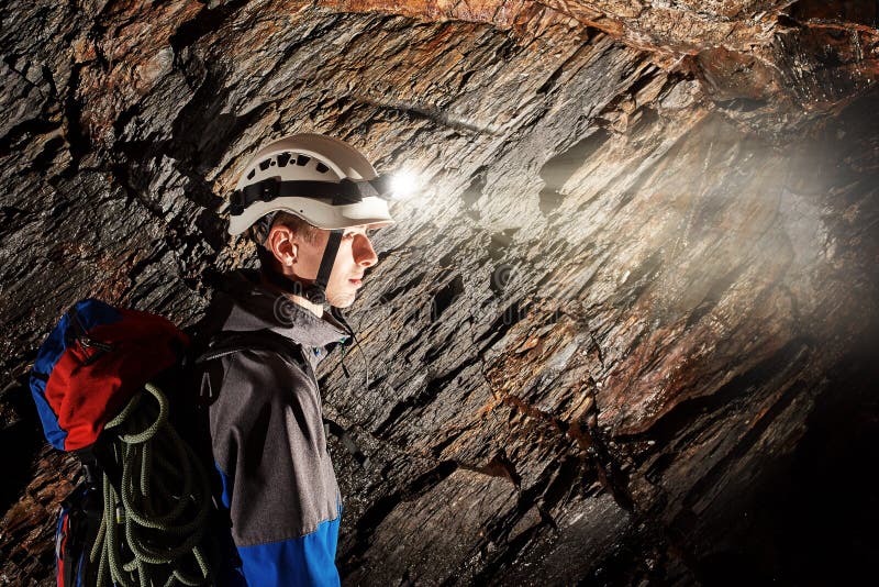 Cave Exploration with Helmet and Headlight Stock Image - Image of ...