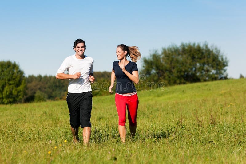 Happy jogging couple. stock image. Image of recreation - 31666089