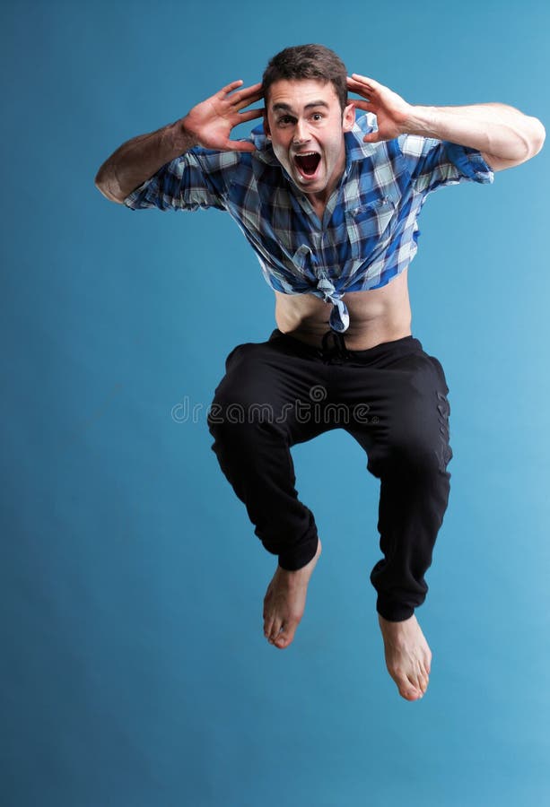 Young Man Jumping Gray Background Stock Photo - Image of freestyle ...