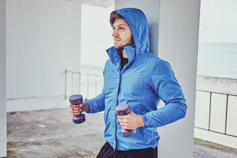 Active Student is Doing Exercises with Dumbbells Stock Photo - Image of ...