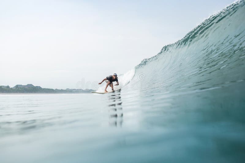 Young Sportive Man Riding Surfboard Stock Photo - Image of handsome ...