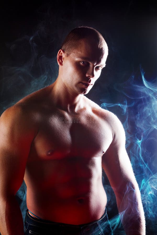 Young Sporty Man Over Smoke. Stock Photo - Image of active, adult: 15612812