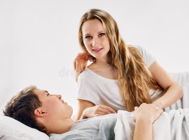 Young spouses in bed stock image. Image of girlfriend - 87842513