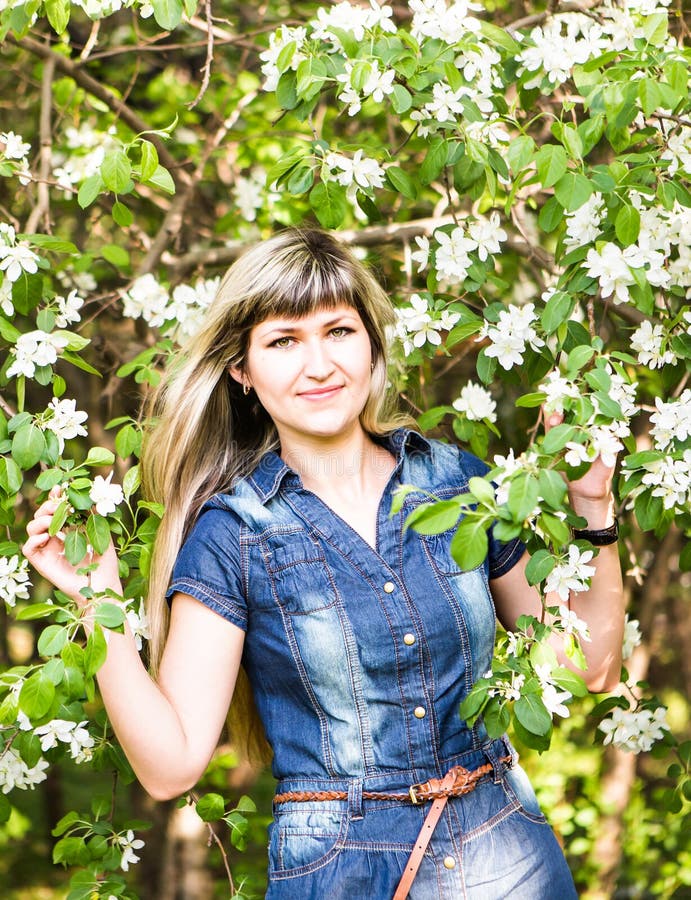 Young Spring Woman in Blooming Tree Stock Image - Image of look, nice ...