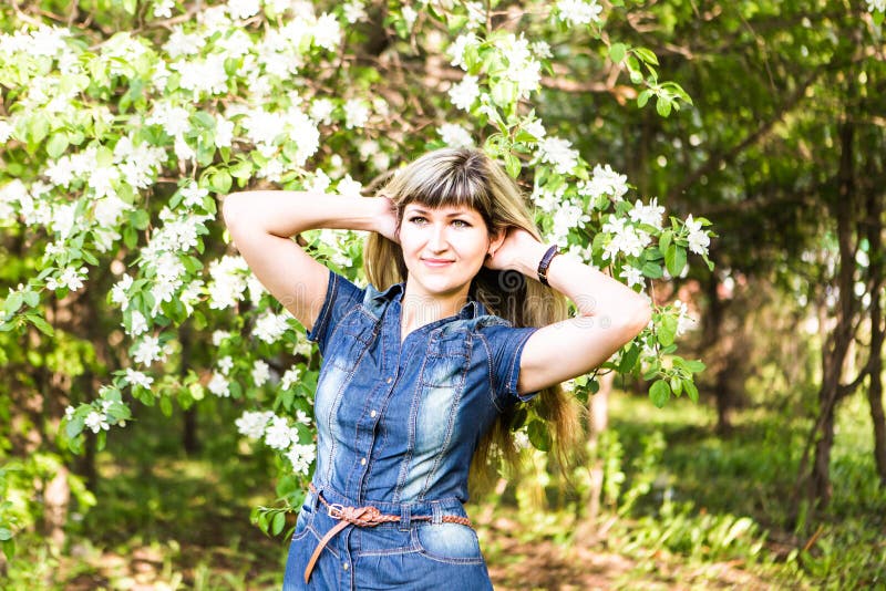 Young Spring Woman in Blooming Tree Stock Photo - Image of healthy ...