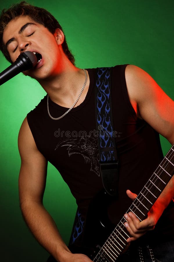 Young star singing in mike stock photo. Image of handsome - 6743144