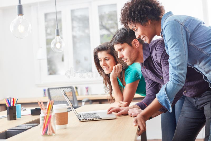 Start-up Team Together on Laptop Computer Stock Image - Image of ...