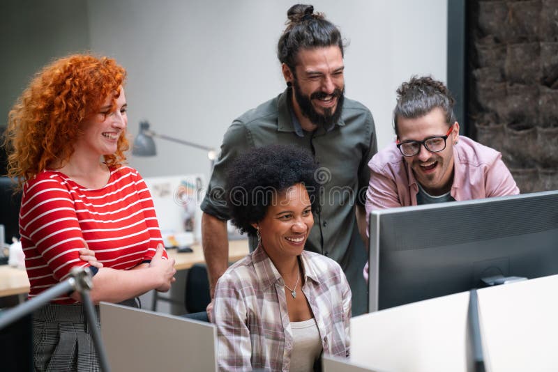 Young Startup Business People Having Fun, Working and Chatting at ...