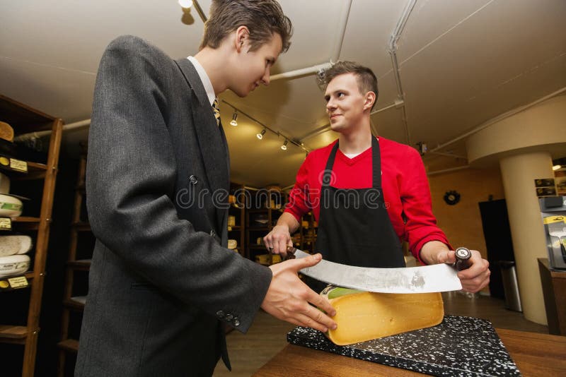 Young Store Clear Cutting Cheese for Businessman Stock Photo - Image of ...