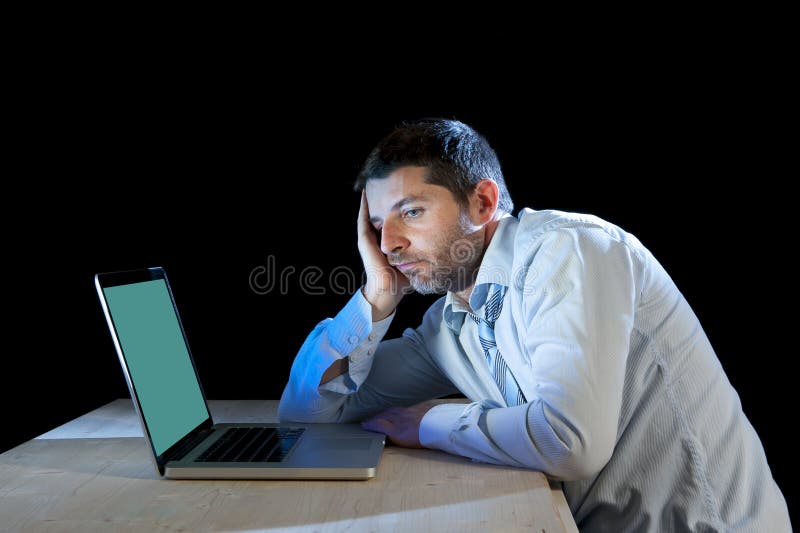 Young Stressed Businessman Working on Desk with Computer Laptop in ...