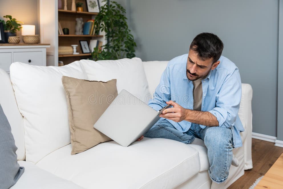 Young Stressed Freelance Man Working at Home Have Problem with Laptop ...