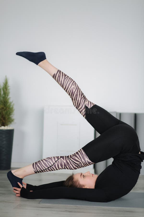 Young Stretching Master Show Differnt Poses for Stretch Stock Image ...