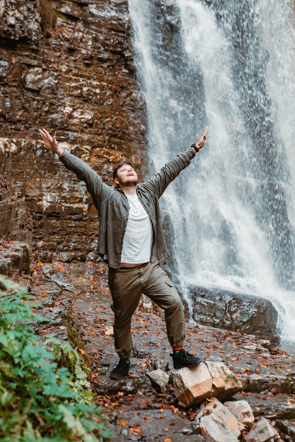 Young Strong Man Hiker Looking the Waterfall Stock Image - Image of ...