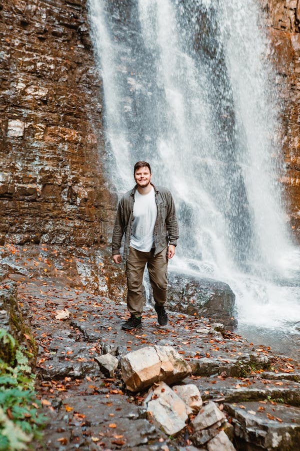 Young Strong Man Hiker Looking the Waterfall Stock Image - Image of ...