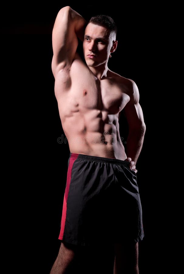 Young strong man isolated stock photo. Image of athlete - 139519860