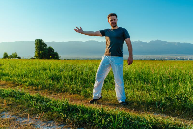 Young Strong Successful Man Posing in Summer Field Stock Image - Image ...