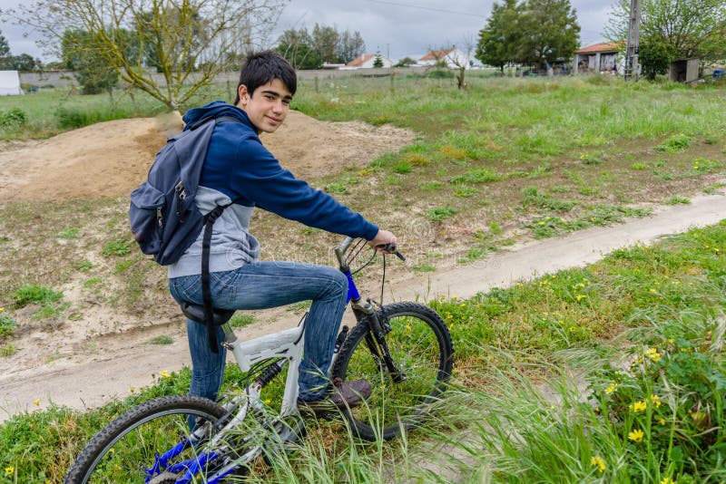 Young Student with Backpack and Bicycle. Go To School Stock Photo ...