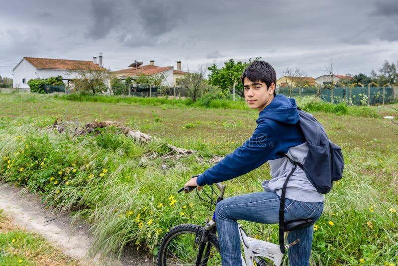 Young Student with Backpack and Bicycle. Go To School Stock Photo ...