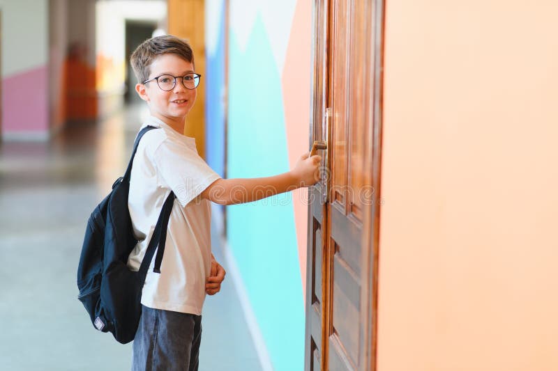 Schoolboy Opening Classroom Door, Ready for Learning and Studying Stock ...