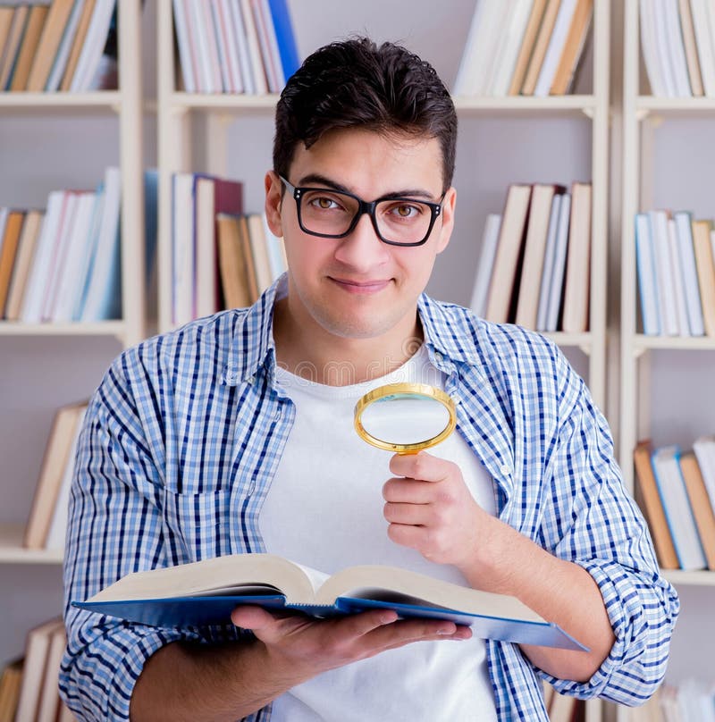 The Young Student with Books Preparing for Exams Stock Photo - Image of ...