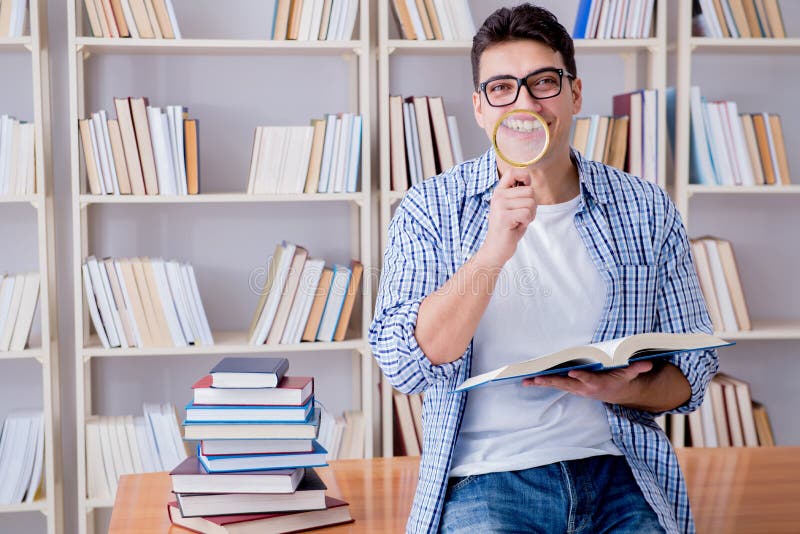 The Young Student with Books Preparing for Exams Stock Photo - Image of ...