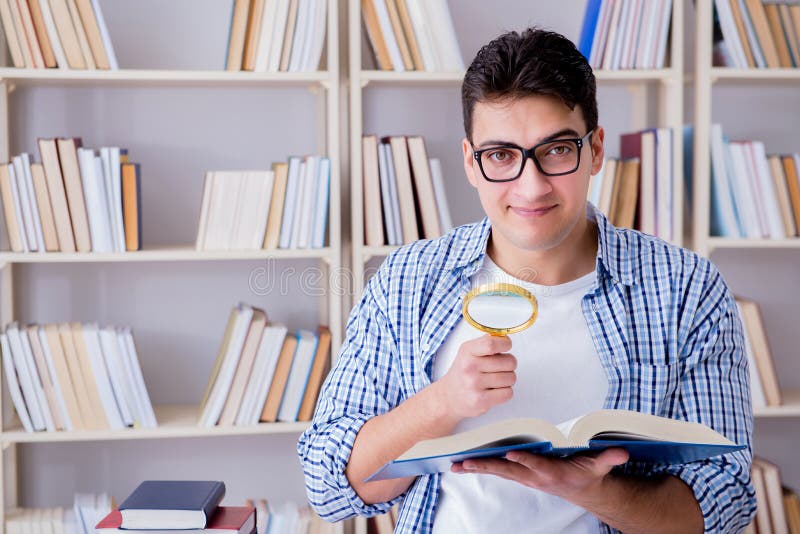 The Young Student with Books Preparing for Exams Stock Photo - Image of ...