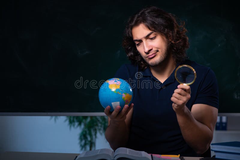 Young Male Student in the Classroom at Night Stock Image - Image of ...