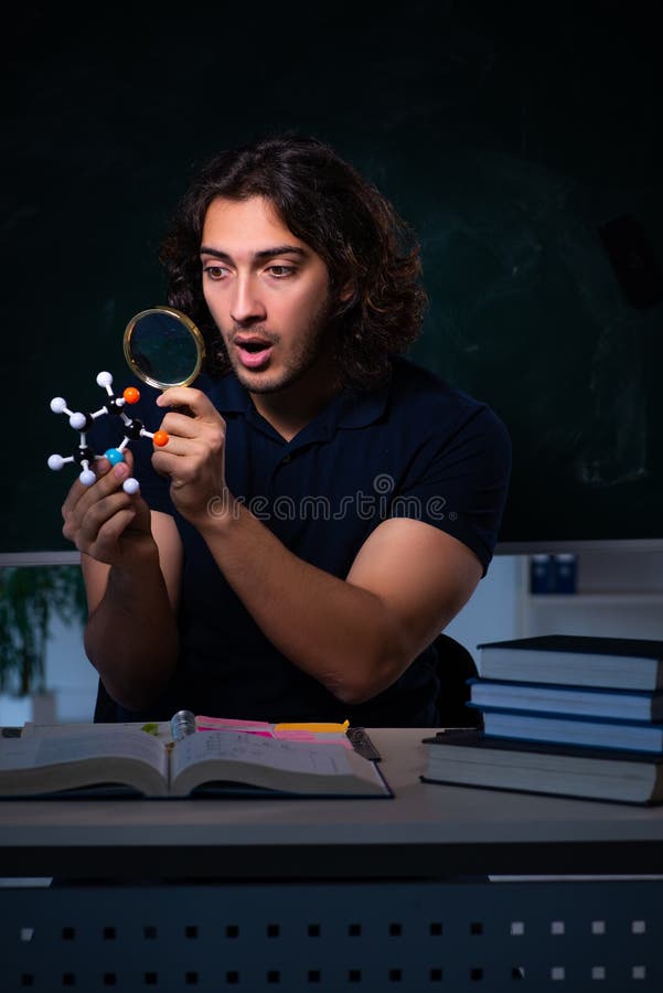 Young Male Student in the Classroom at Night Stock Photo - Image of ...
