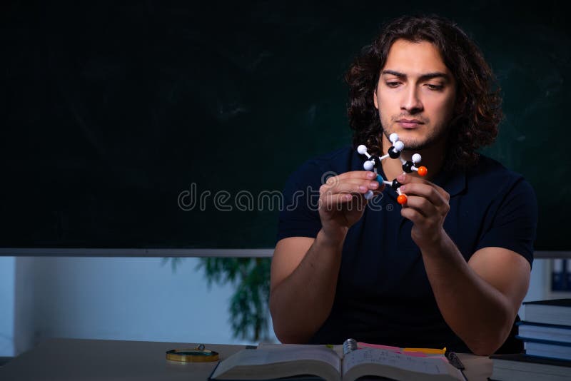 Young Male Student in the Classroom at Night Stock Photo - Image of ...